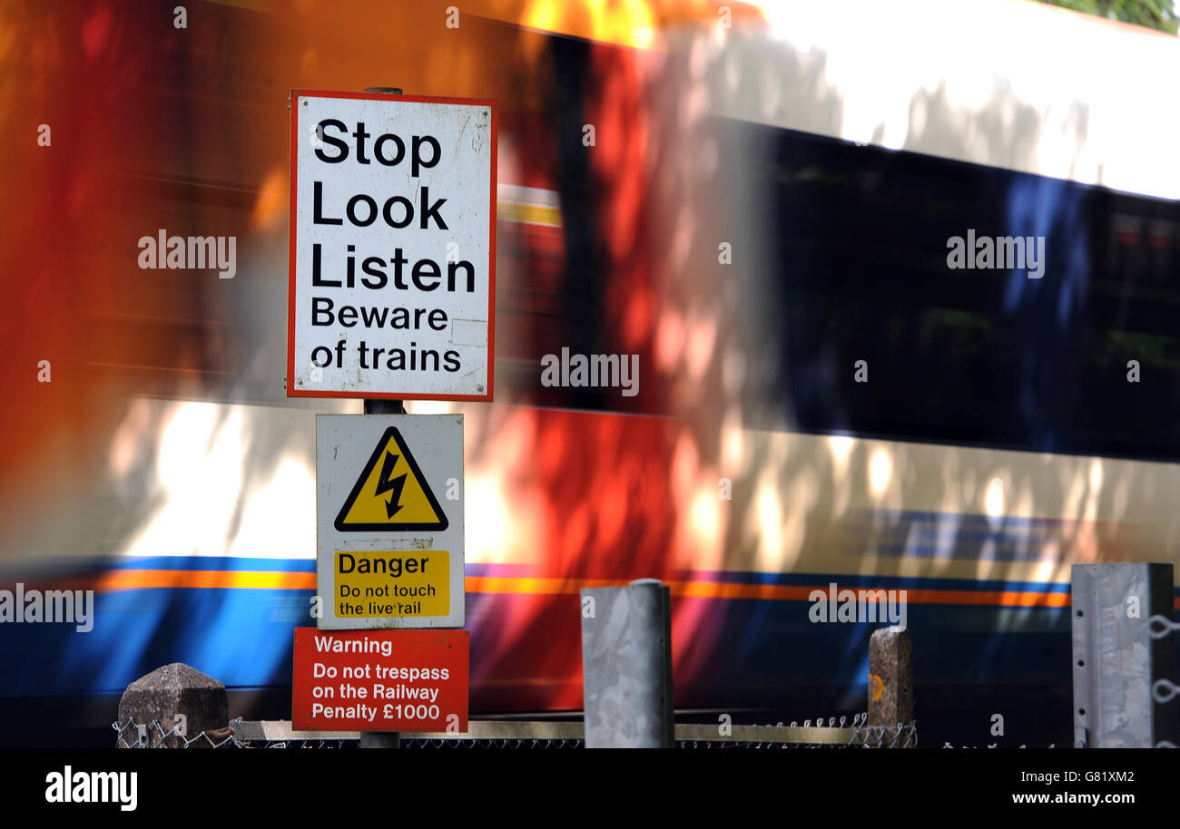Railroad crossing stop look and listen hi-res stock photography and ...