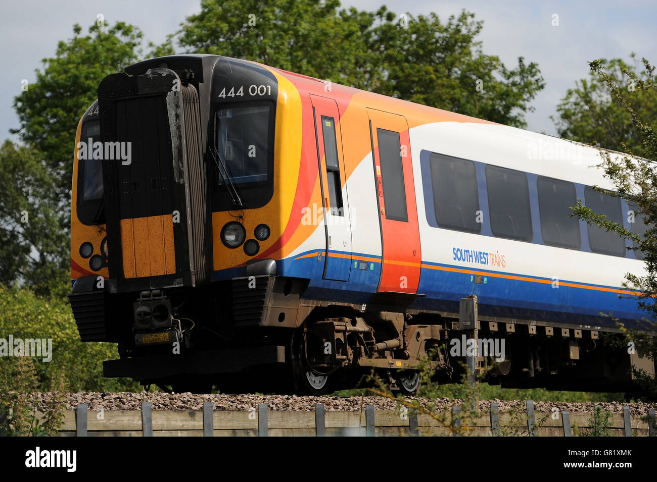 A train from South West Trains makes it's way through Worting Junction ...