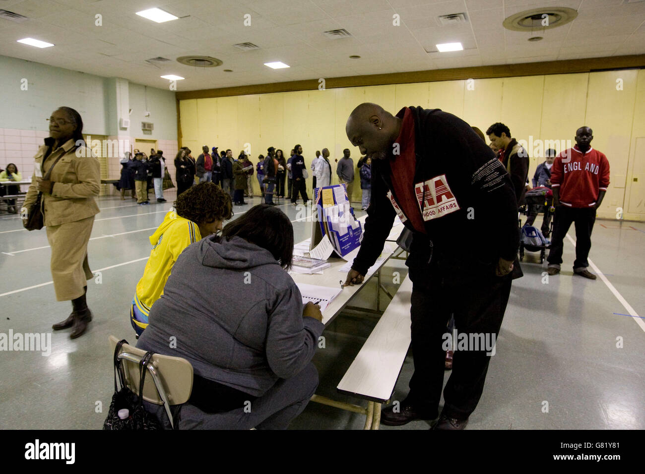 Voters line up to vote in US general election at a voting site in ...