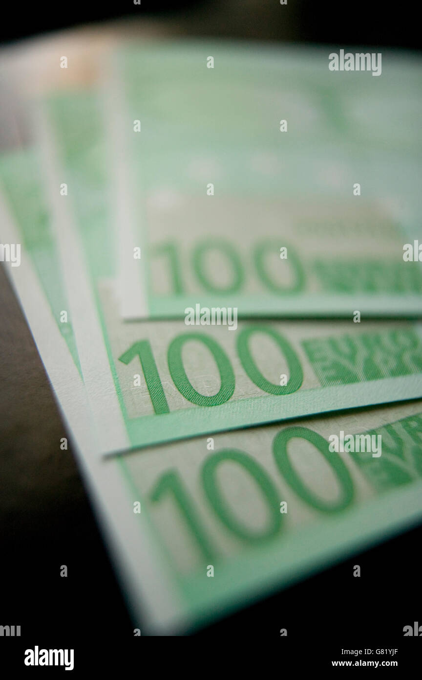 Three green one hundred Euro bank notes. The 13-nation euro bought $1. ...