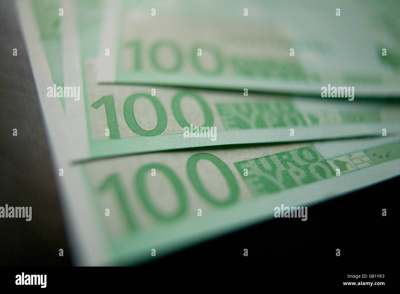 Three green one hundred Euro bank notes. The 13-nation euro bought $1. ...
