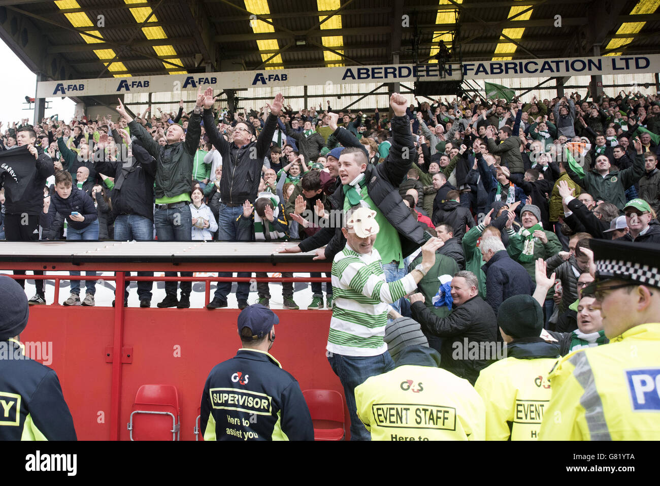 Celtic fans celebrate in the stands following their victory Stock Photo ...