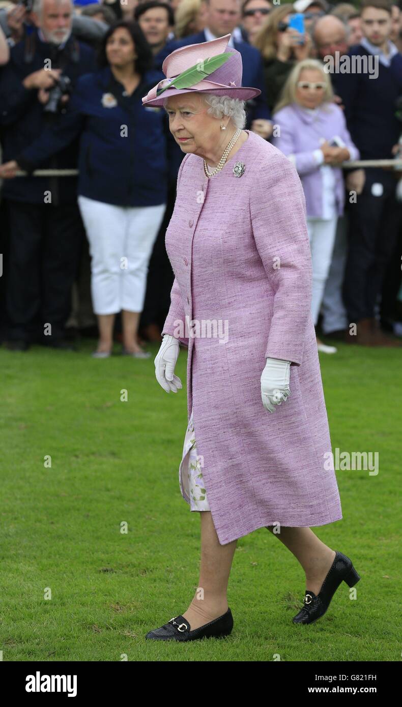 Queen Elizabeth II prepares to present trophies and the Queen's Cup at ...