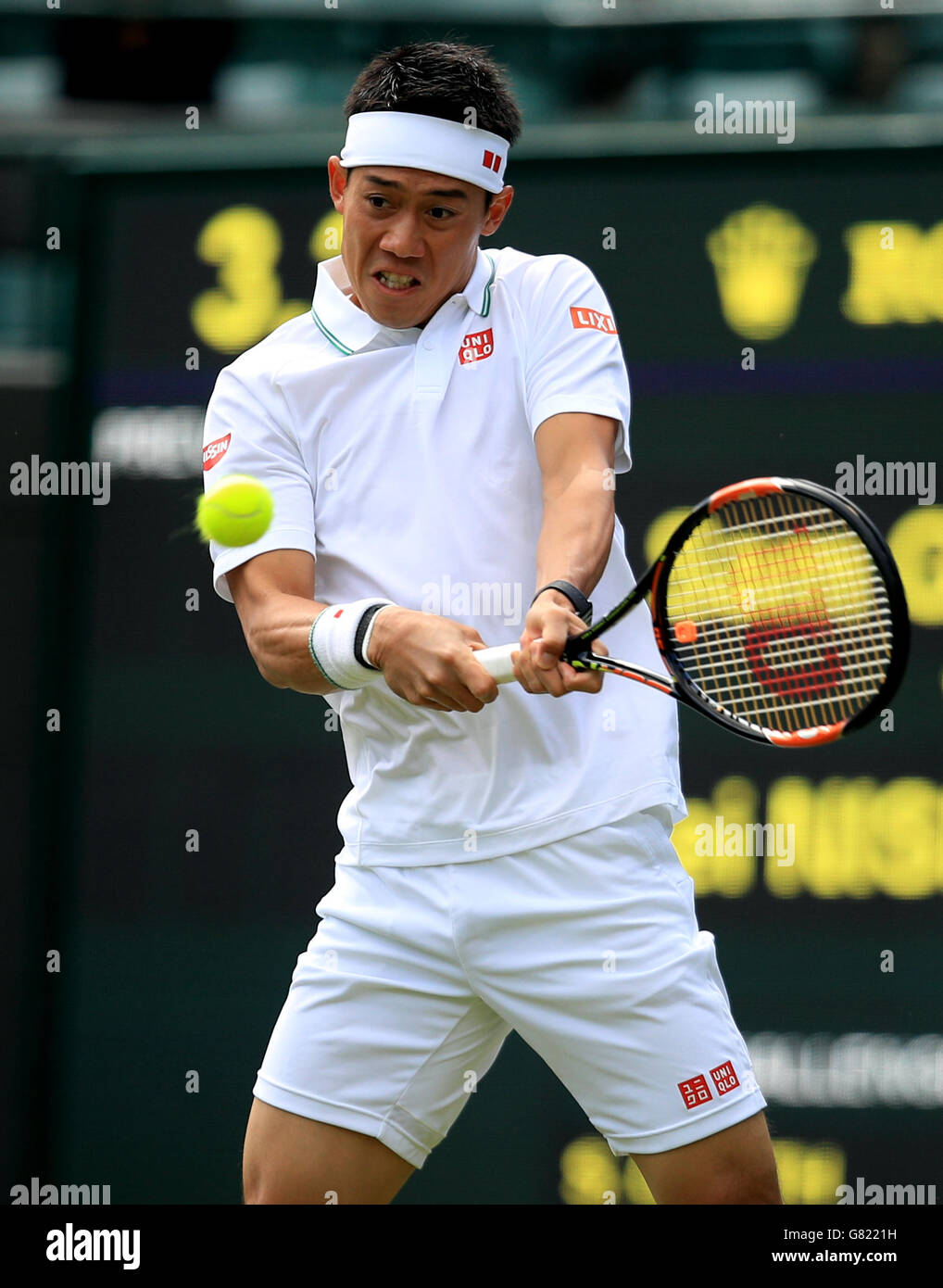 Kei Nishikori in action against Sam Groth on day One of the Wimbledon ...
