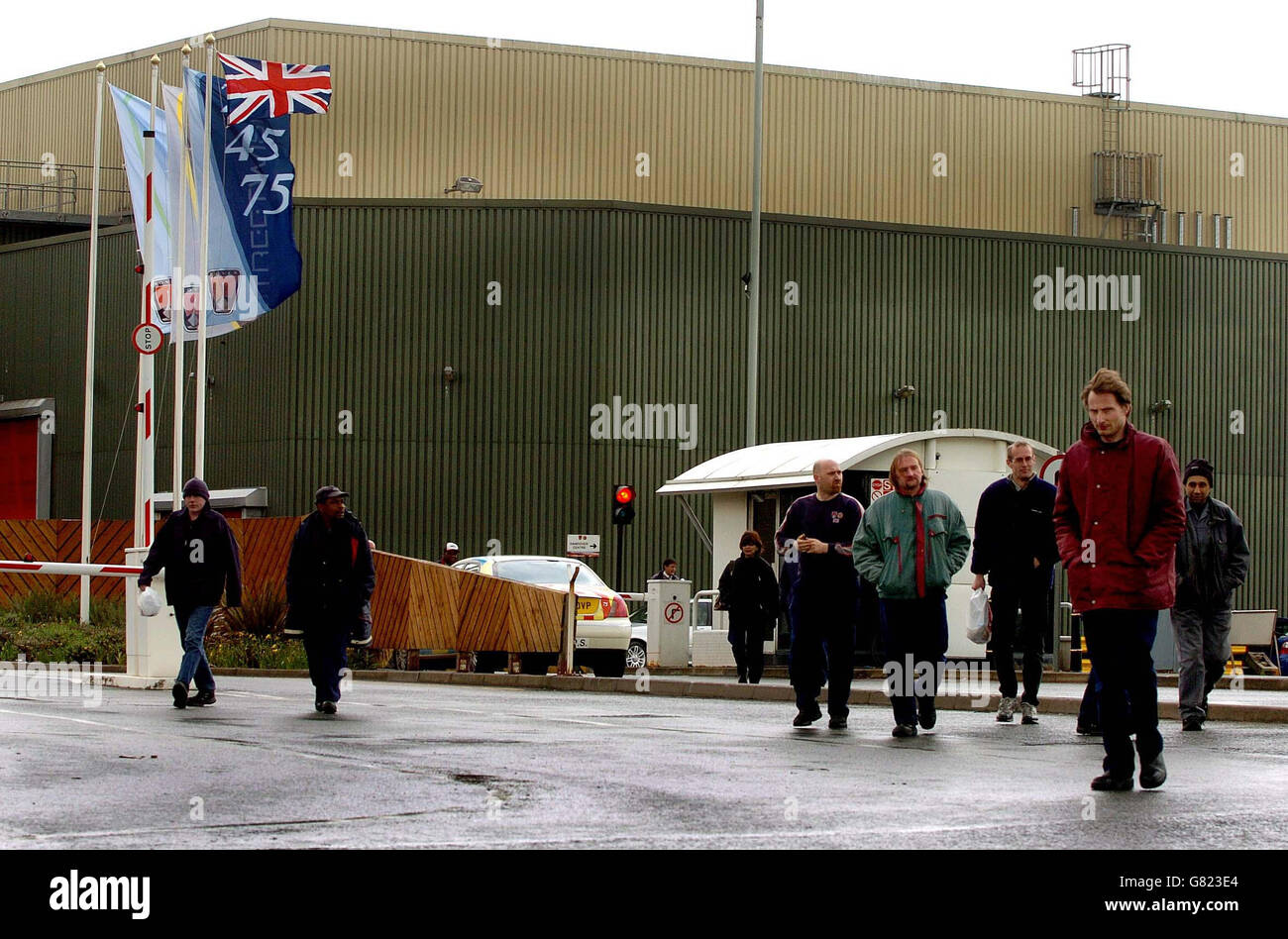 Workers at MG Rover leave the Longbridge plant, after car giant MG ...