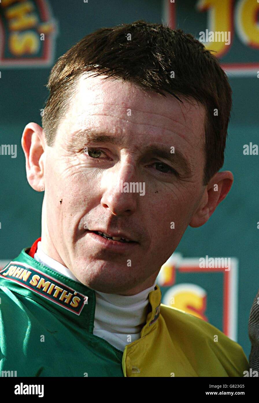 Jockey Tony Dobbin celebrates victory on Turpin Green in the John Smith ...