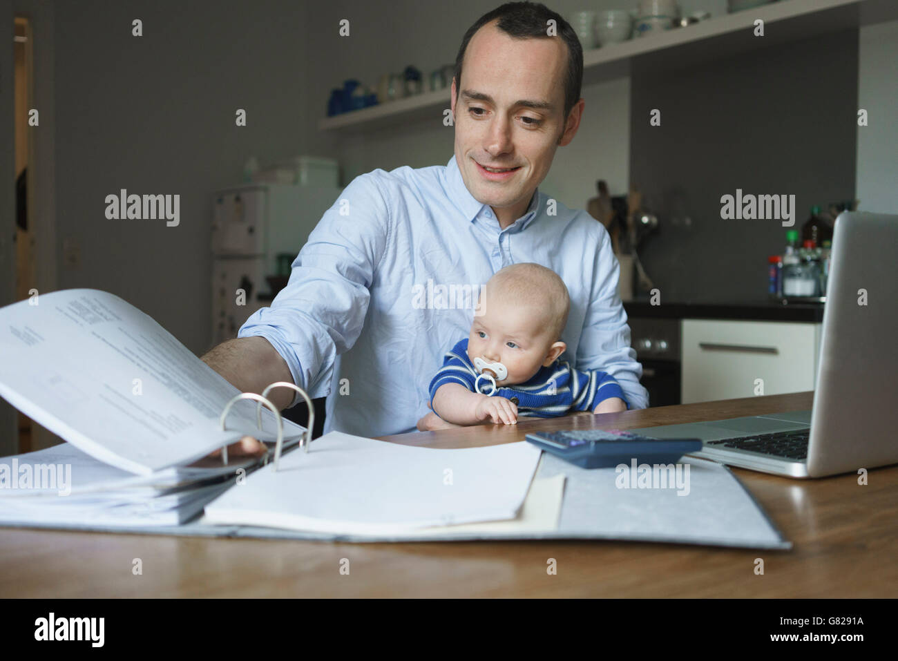 Father carrying son working hi-res stock photography and images - Alamy