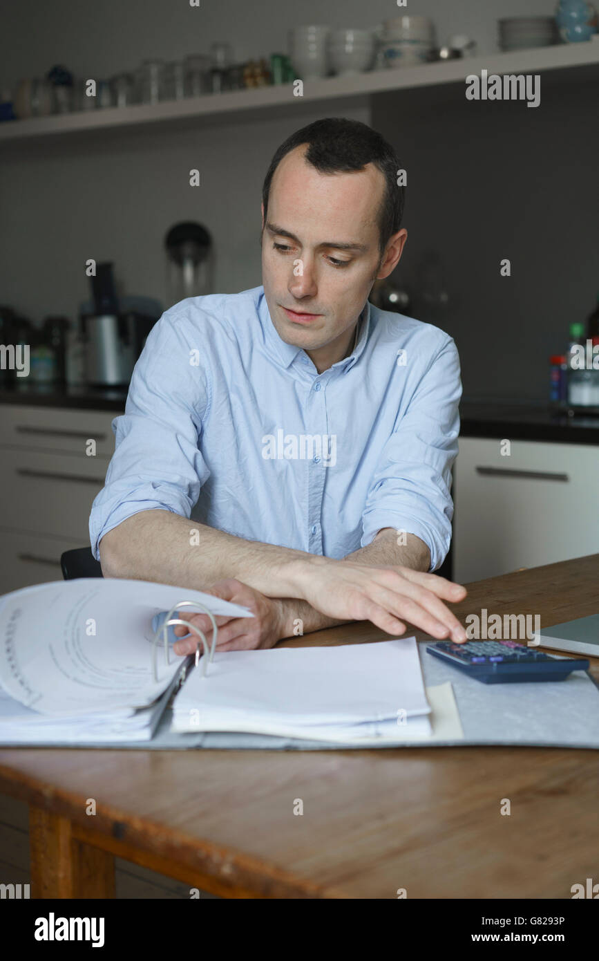 Doing paperwork hi-res stock photography and images - Alamy