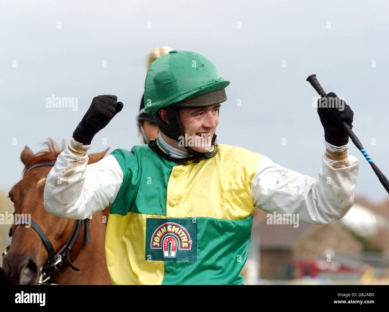 Ruby Walsh celebrates after winning The John Smith's Grand National ...