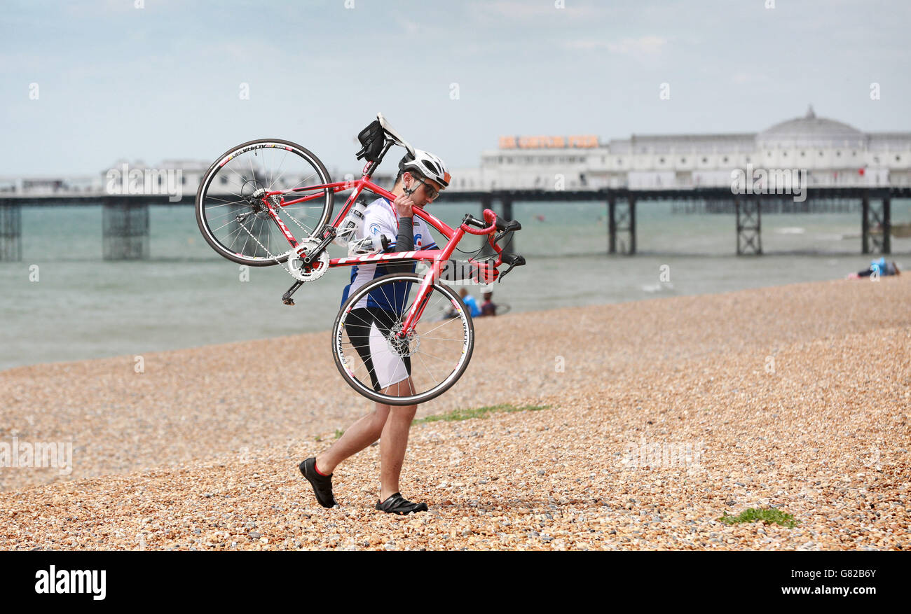 A cyclists on Brighton beach, Sussex, after completing the British ...