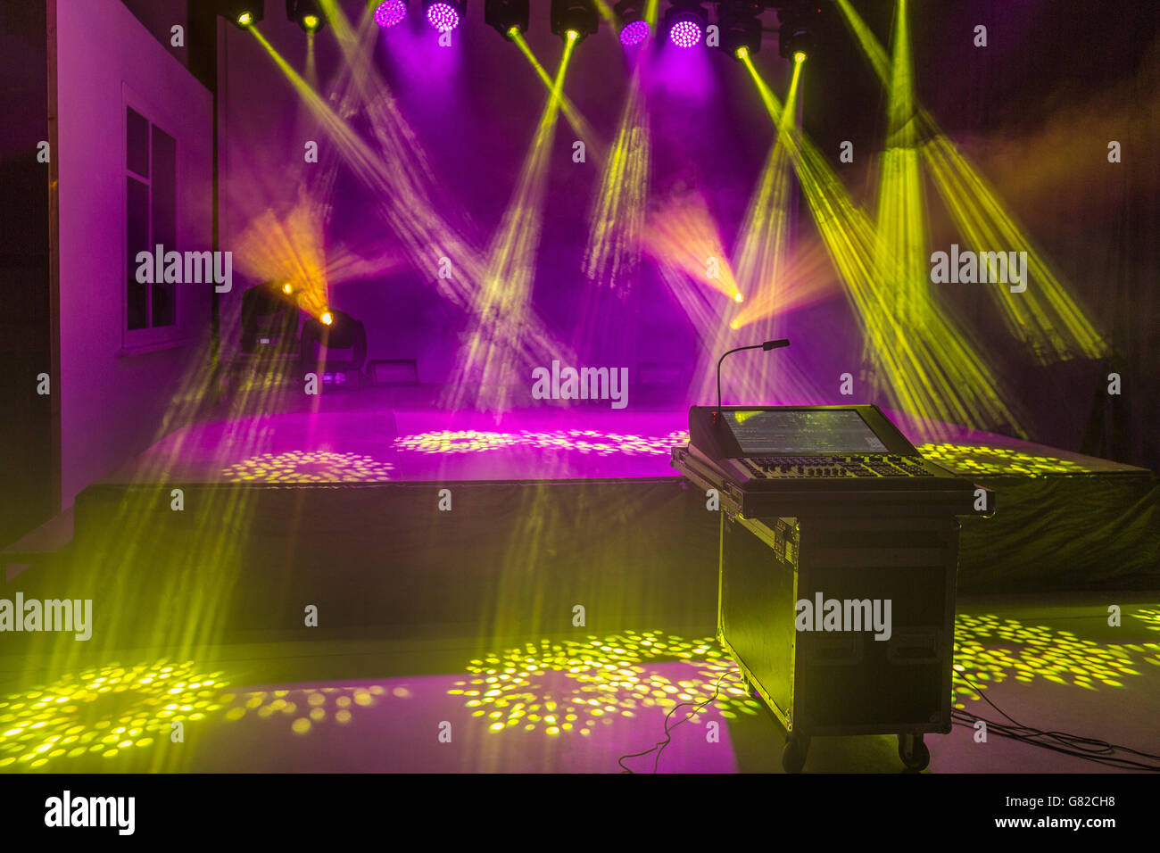 Sound mixer and stage in illuminated studio Stock Photo - Alamy
