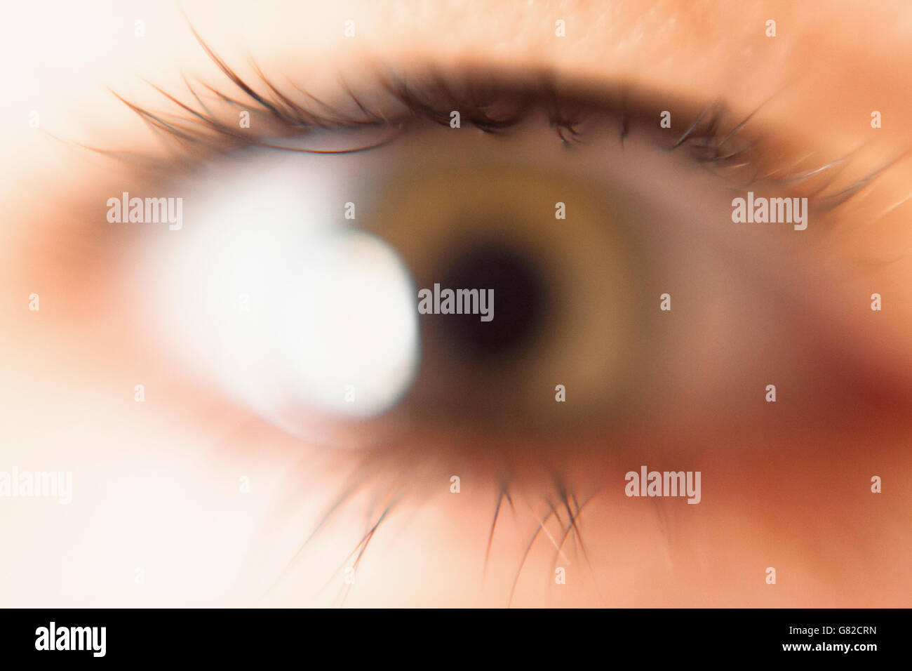 Defocused image of woman's eye Stock Photo - Alamy