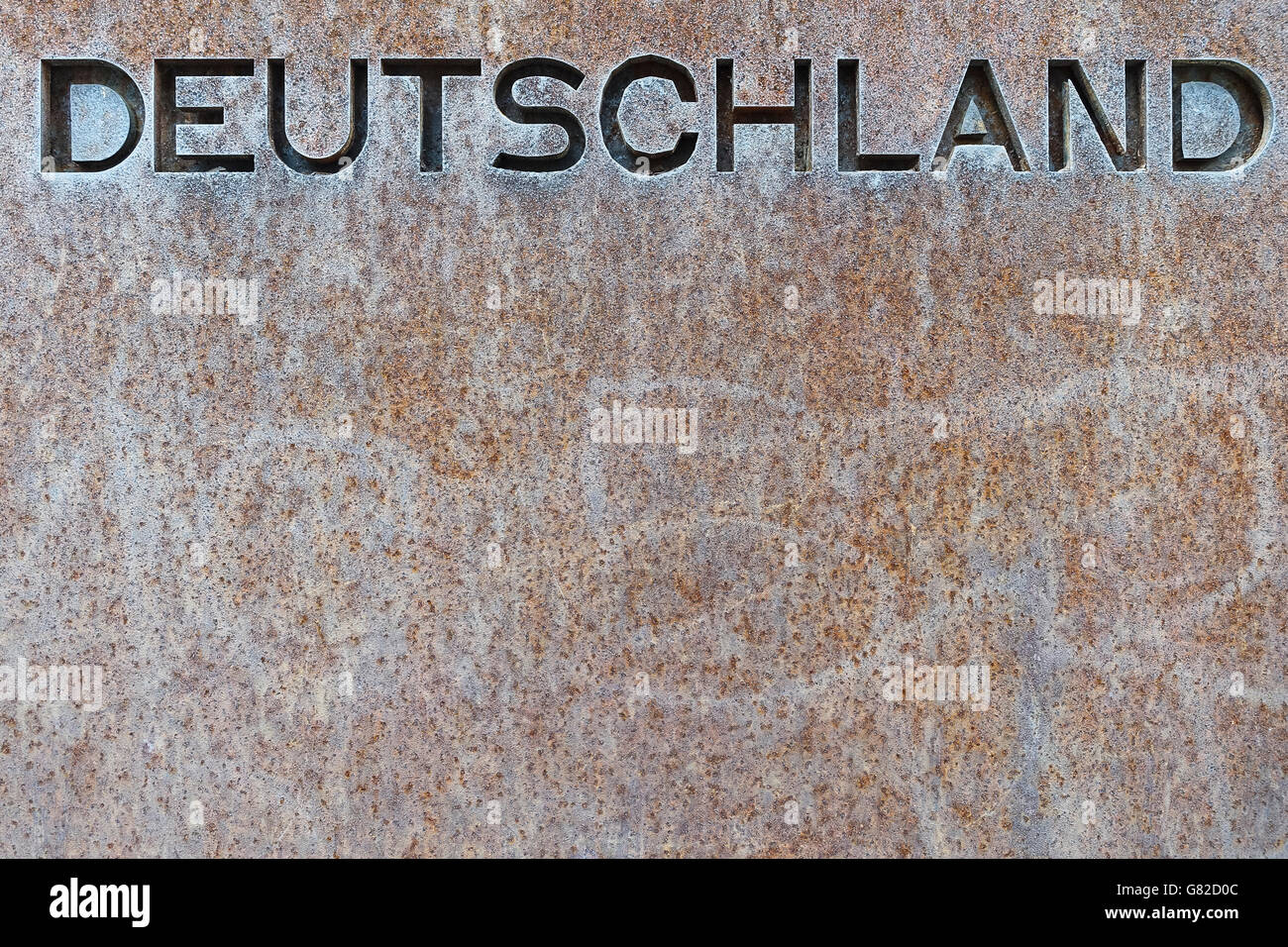 Text carved in rusty metal Stock Photo - Alamy