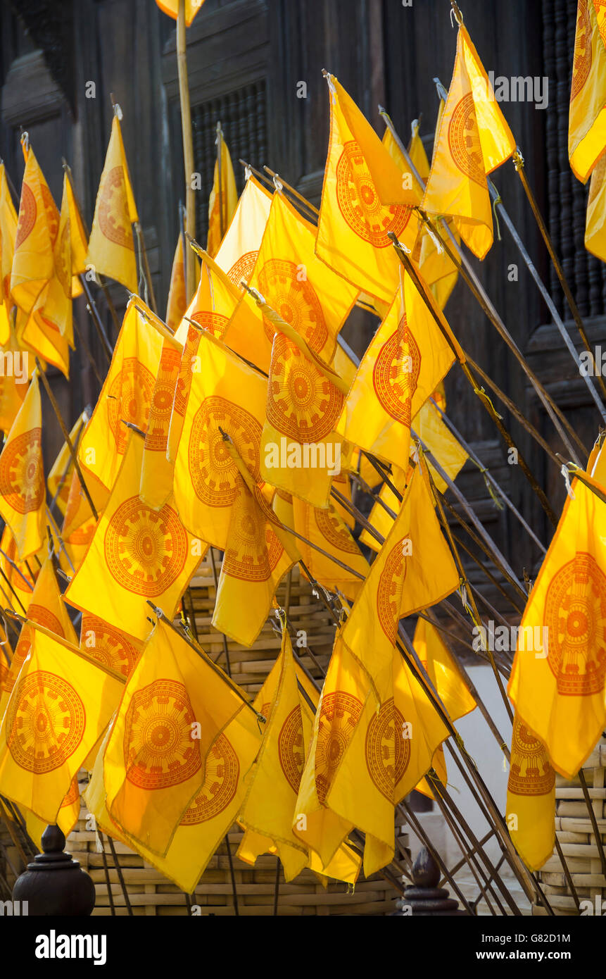 Yellow prayer flags at temple Stock Photo - Alamy