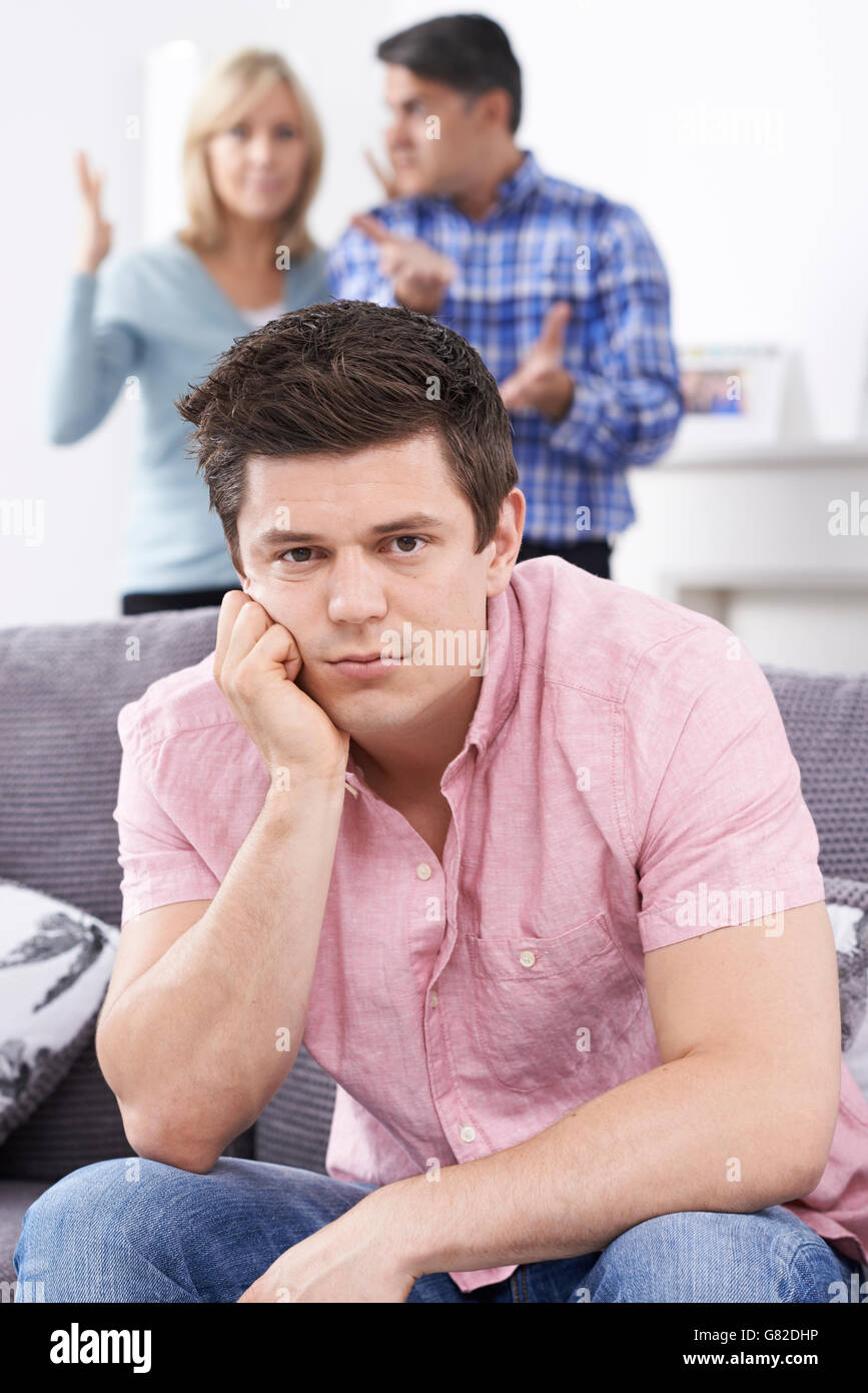 Mature Parents Frustrated With Adult Son Living At Home Stock Photo - Alamy