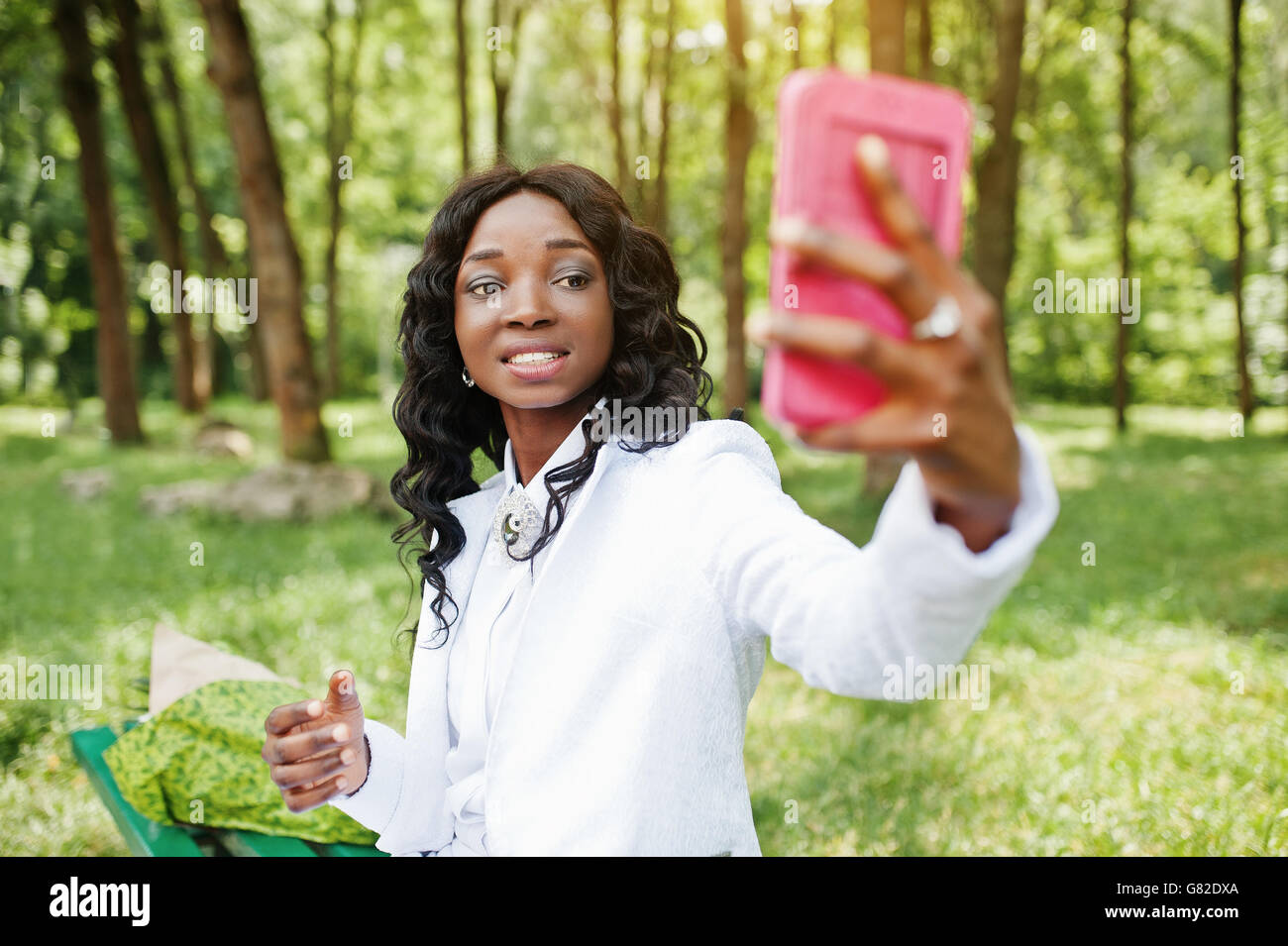 Close up portrait of stylish black african american girl taking selfie ...