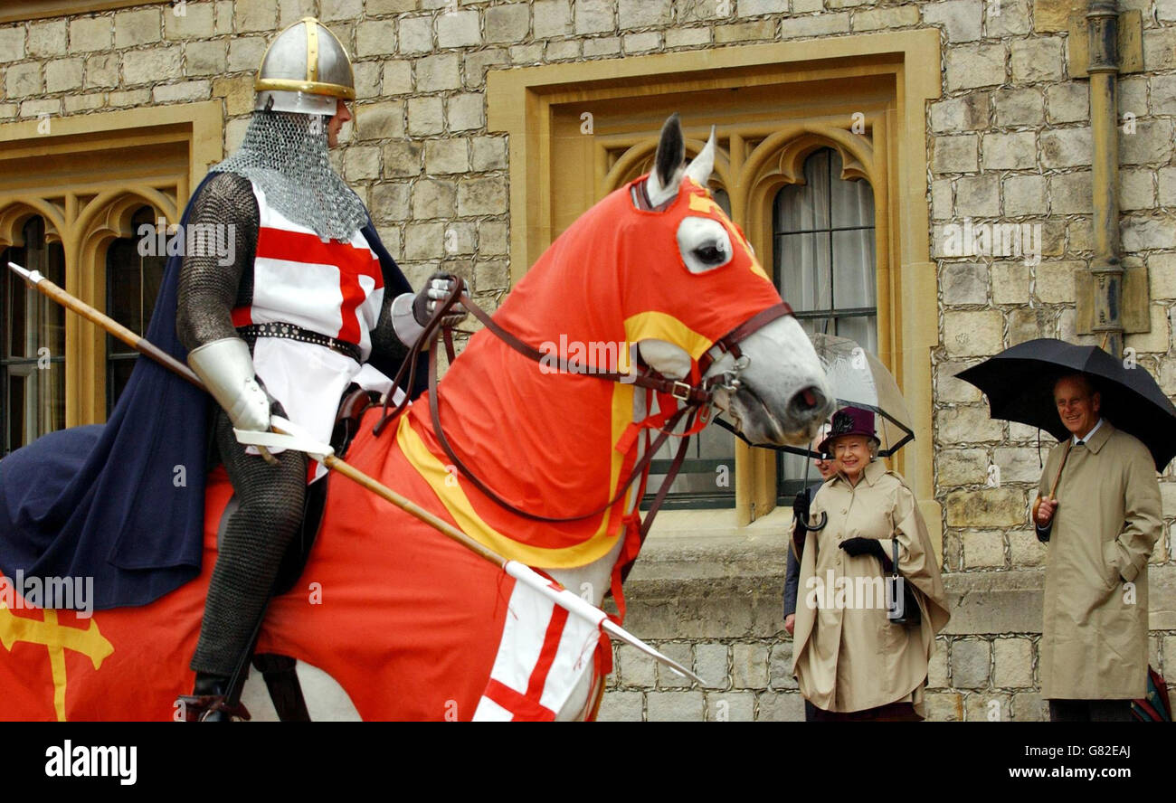 Britain's Queen Elizabeth II and the Duke of Edinburgh watch Sergeant ...