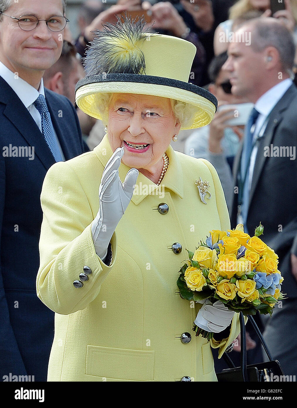 Queen Elizabeth II waves to well wishers after a short walkabout on the ...