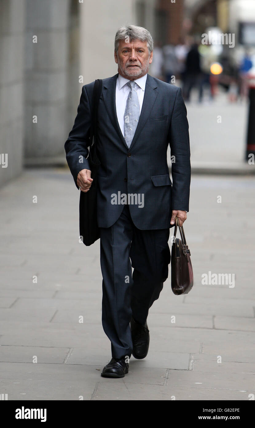 Neil Wallis, the former deputy editor of the News of the World, arrives ...