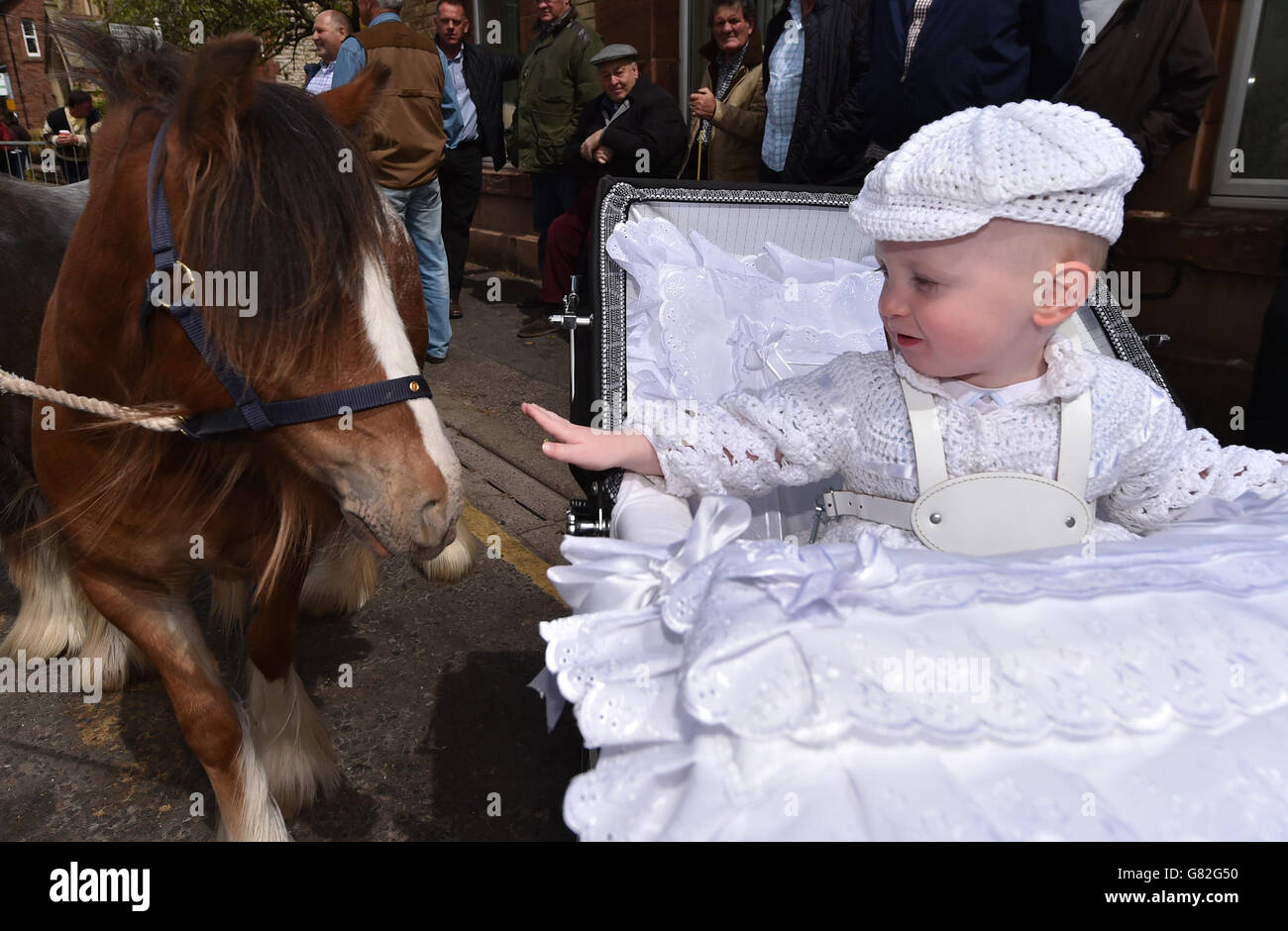 Child in pram at the horse fair in appleby hi-res stock photography and ...
