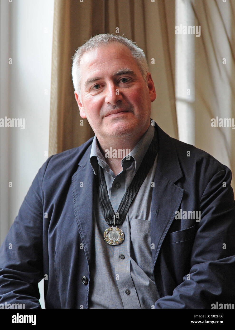 Author, illustrator and political cartoonist Chris Riddell poses for a ...