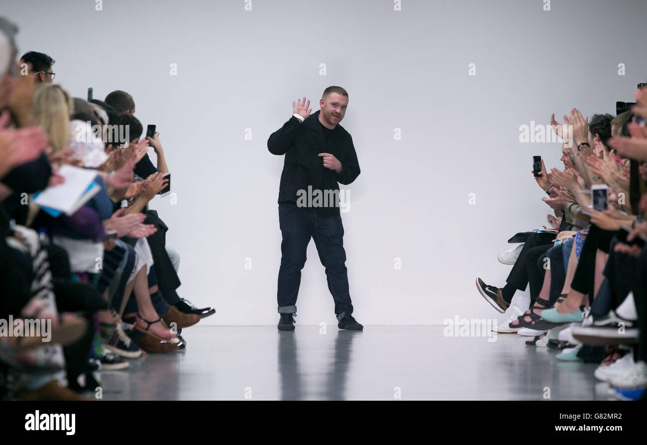 Craig Green on the catwalk following his show during the British ...