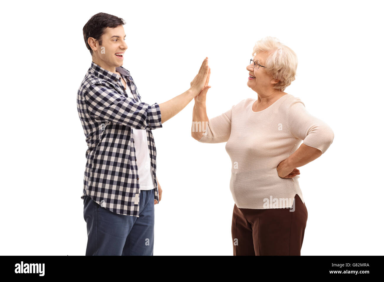 Five young people doing a high five hi-res stock photography and images ...