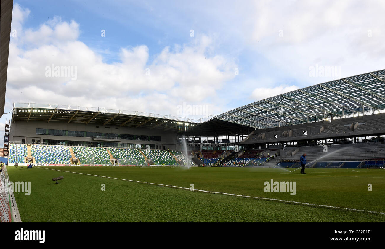 Ground staff prepare the Windsor Park pitch before UEFA European ...