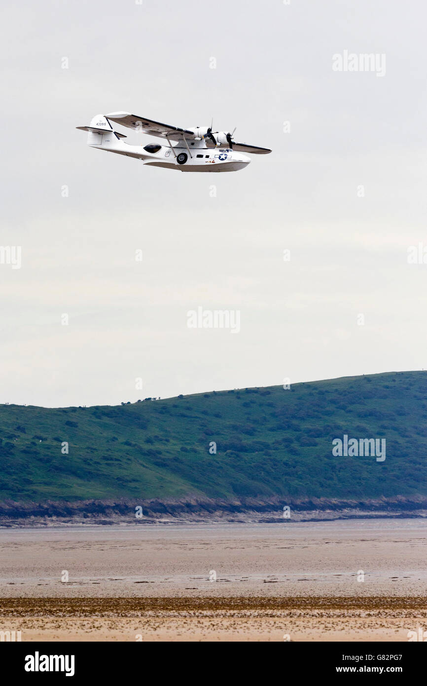 PBY Catalina Amphibian Sea Plane flying over the beach at Weston-Super ...