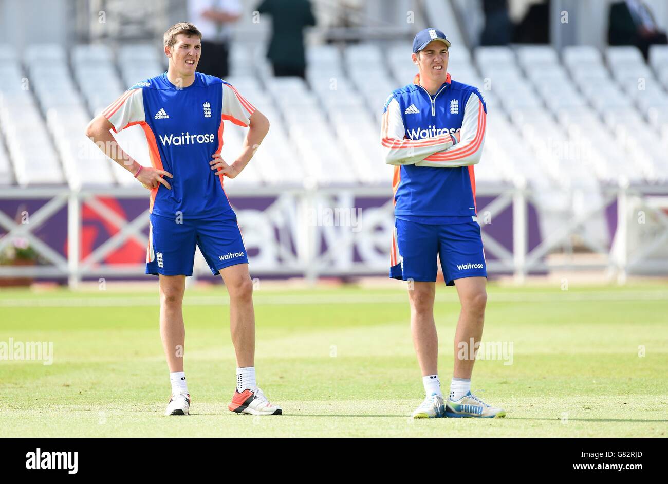 England's Jamie Overton (right) bowls past brother Craig, during a nets ...