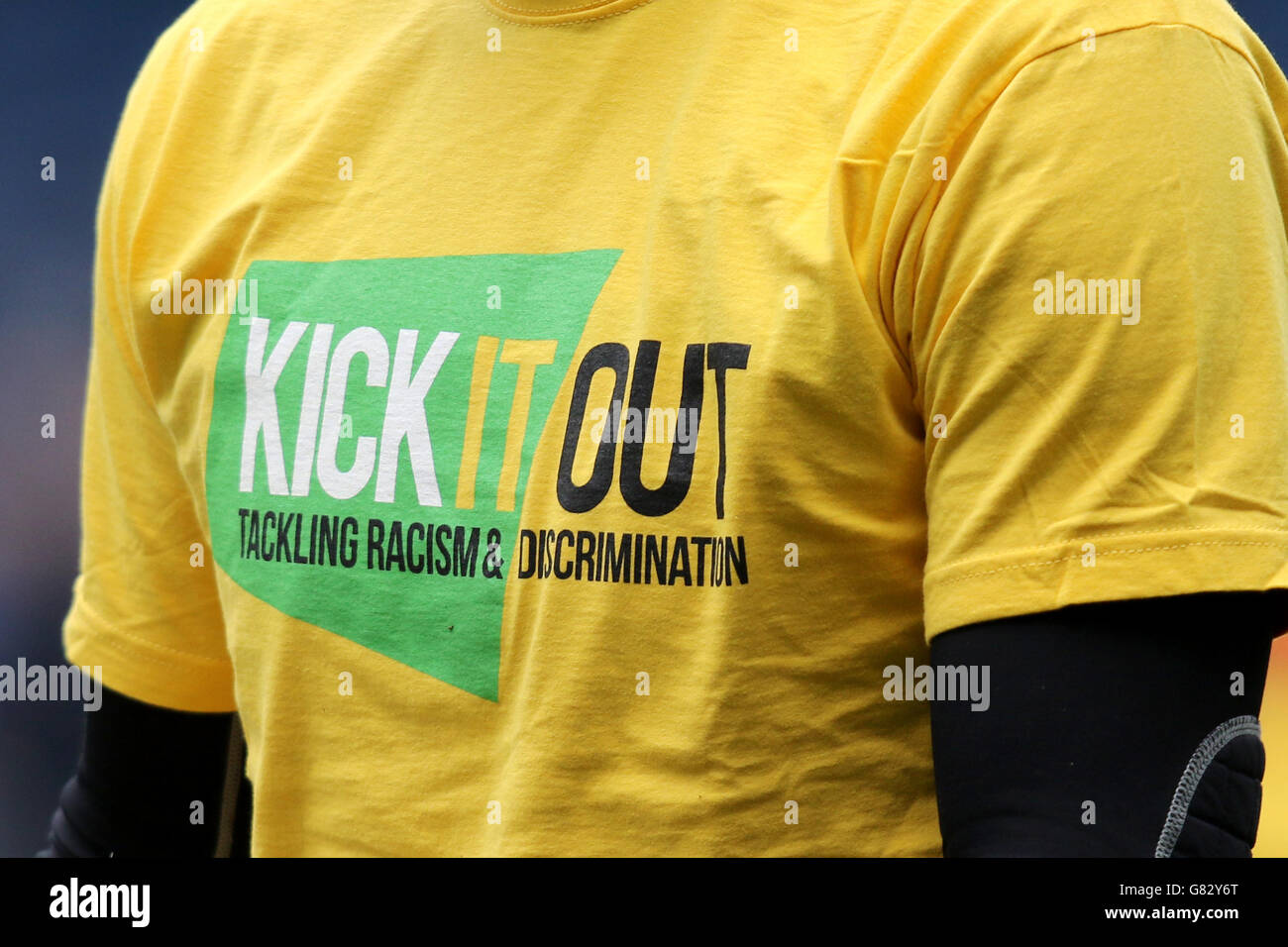 Half length kick it out racism t shirt hi-res stock photography and ...