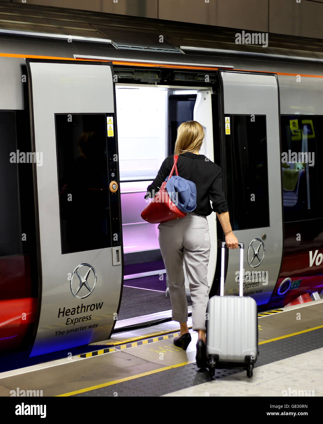 A Heathrow Express train at Heathrow Airport in West London Stock Photo ...