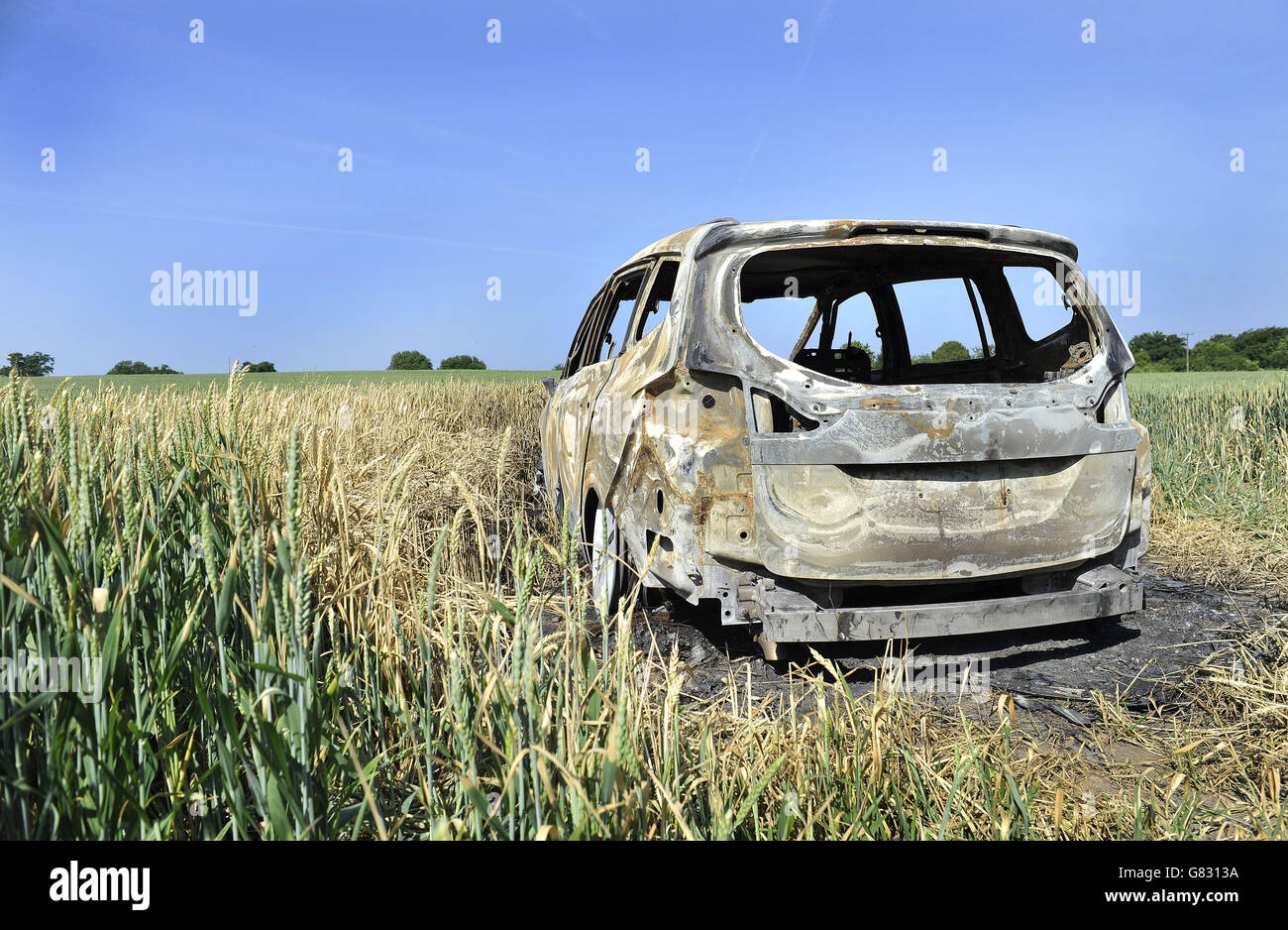 Burnt out vehicle. A burnt out vehicle dumped in a field in Navestock ...