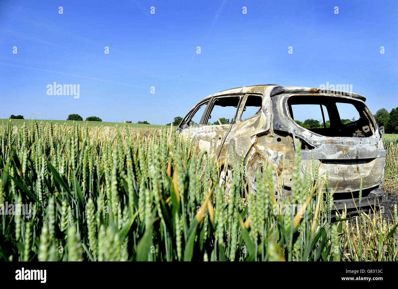 Burnt out vehicle. A burnt out vehicle dumped in a field in Navestock ...