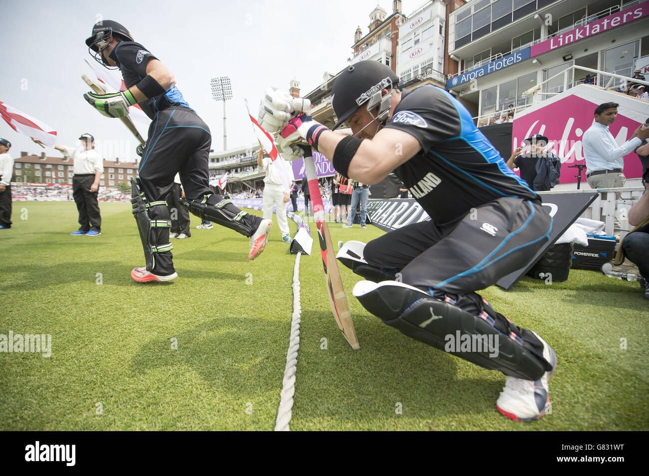 New Zealand's Martin Guptill (left) and Brendon McCullum (right) take ...