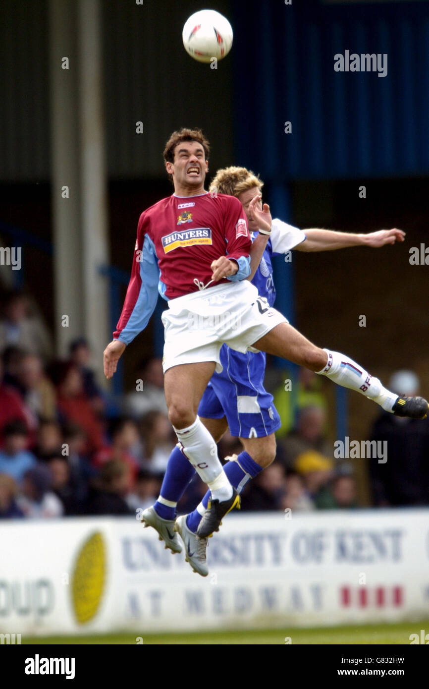 Gillingham's Nicky Southall and Burnley's Jean Louis Valois battle for ...
