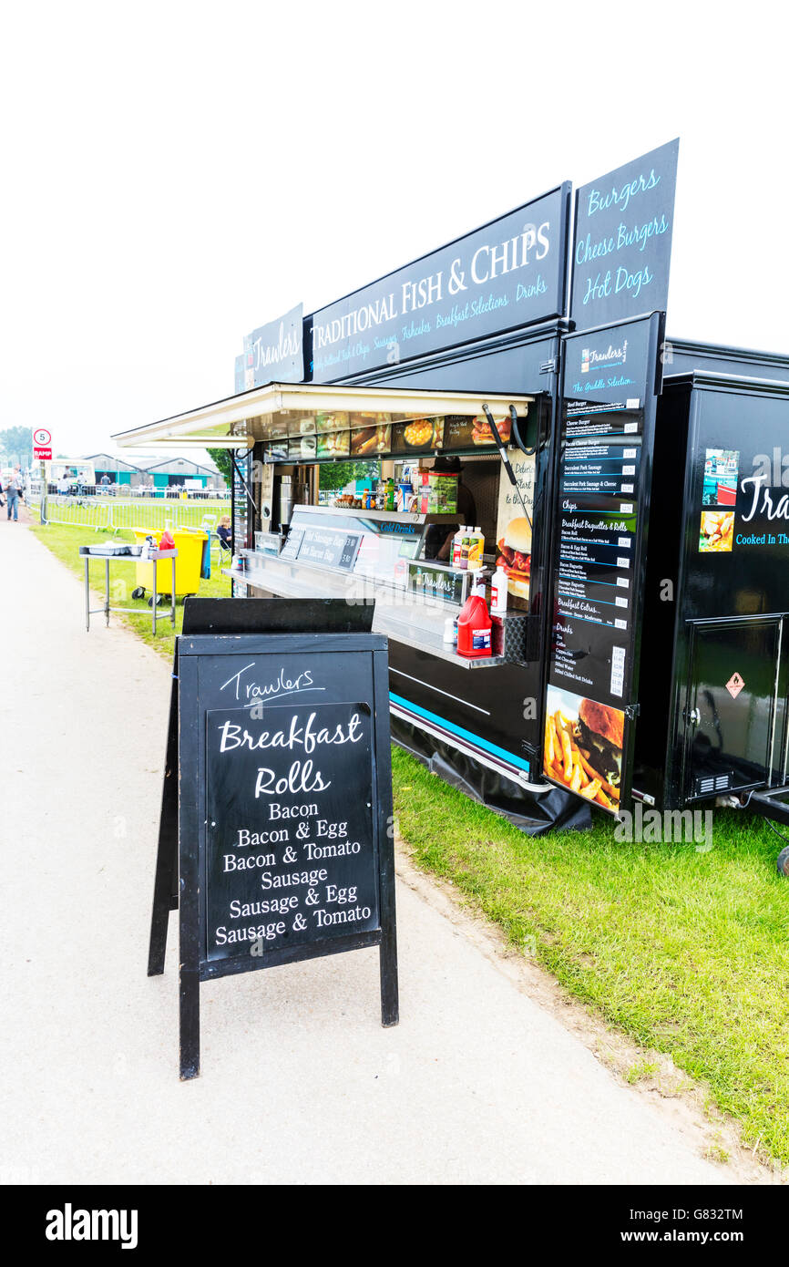 Fish and chips stall food stand outside roadside vendor cooking on ...