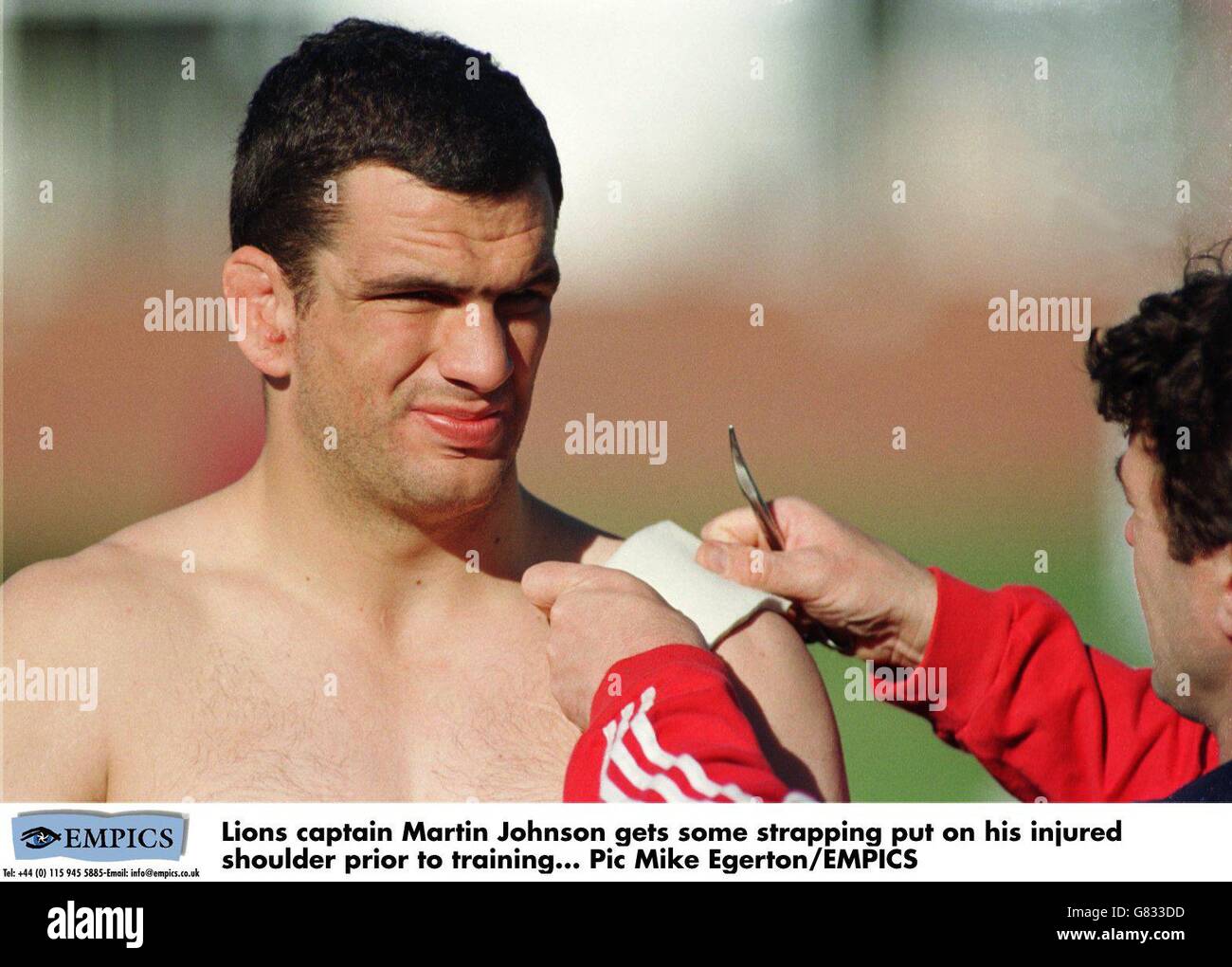 Lions captain Martin Johnson gets some strapping put on his injured ...