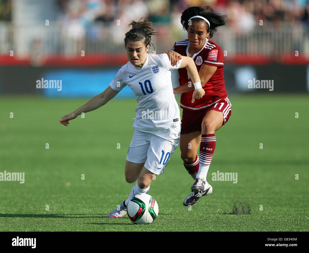 England's Karen Carney and Mexico's Monica Ocampo battle for the ball ...