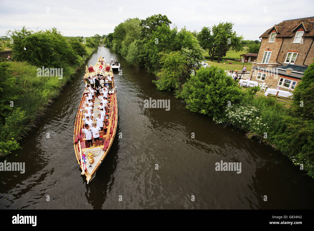 The Royal Barge Gloriana on the River Thames passes through Old Windsor ...