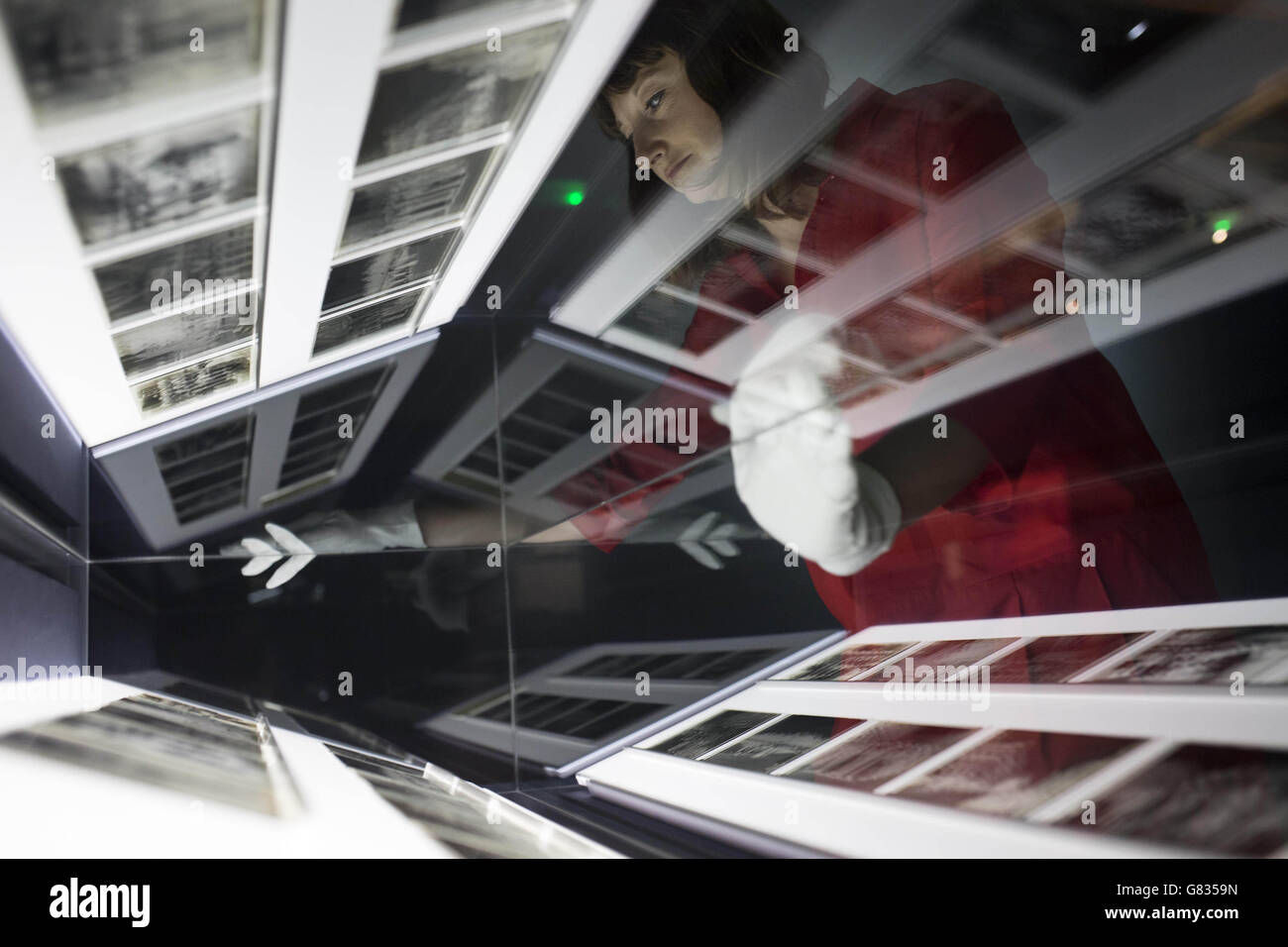 Exhibition curator Anna Sparham inspects a display at the Museum of ...