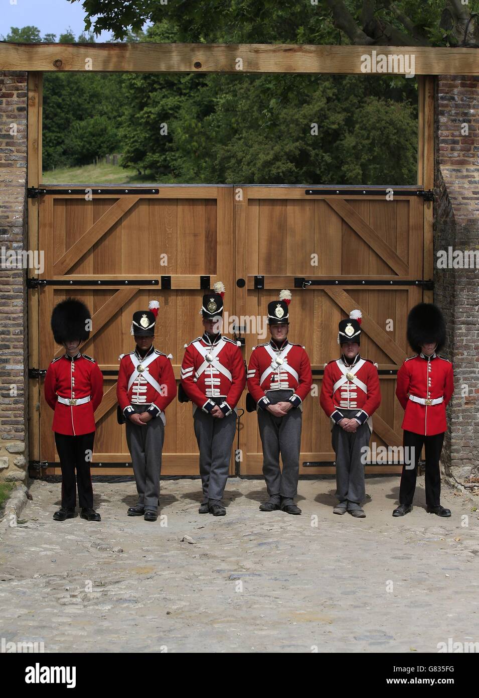 Coldstream Guardsmen dressed in 1815 uniform stand in front of the new ...