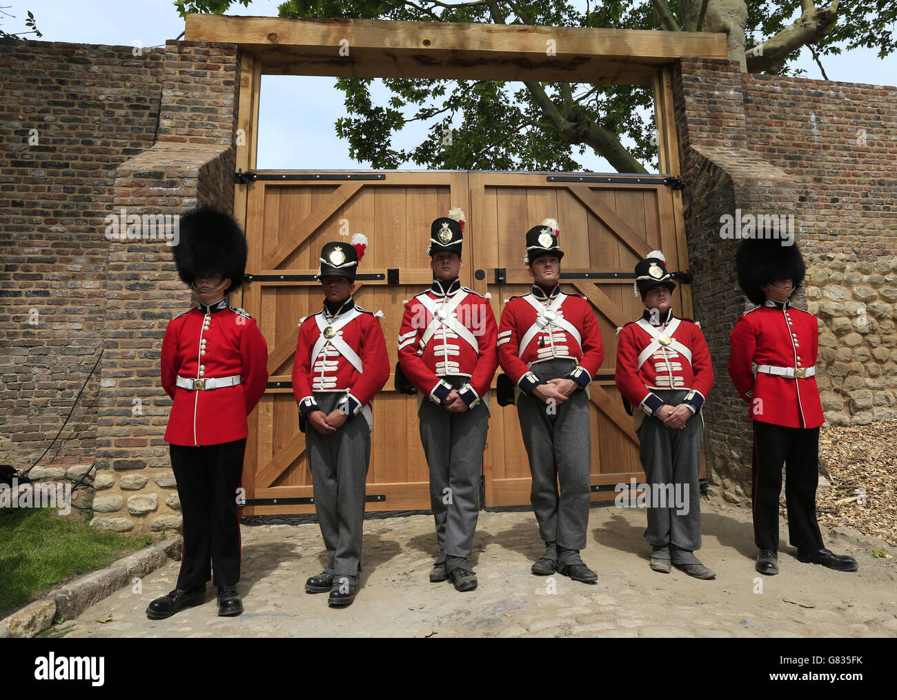Coldstream Guardsmen dressed in 1815 uniform stand in front of the new ...
