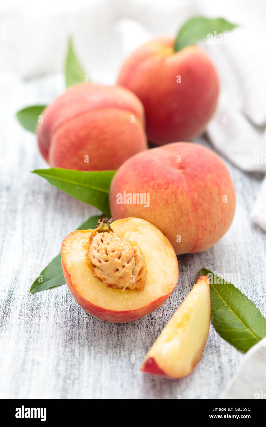 Group of people eating peach hi-res stock photography and images - Alamy
