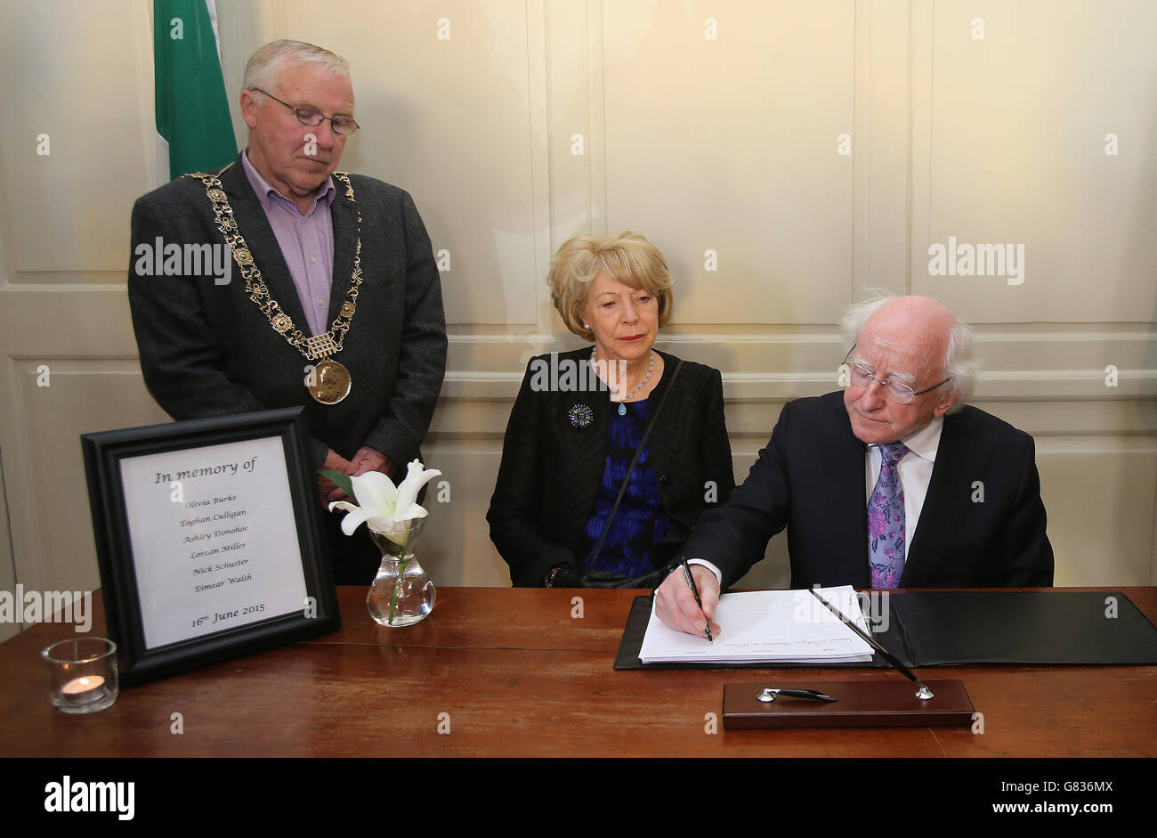Dublin Lord Mayor Christy Burke (left) watches as President Michael D ...