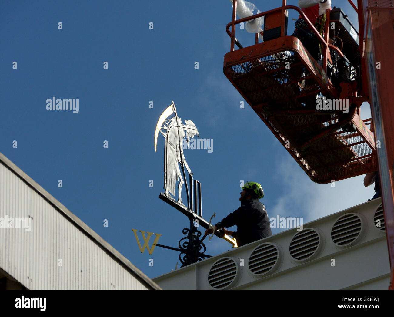 Old Father Time weather vane reinstated Stock Photo - Alamy