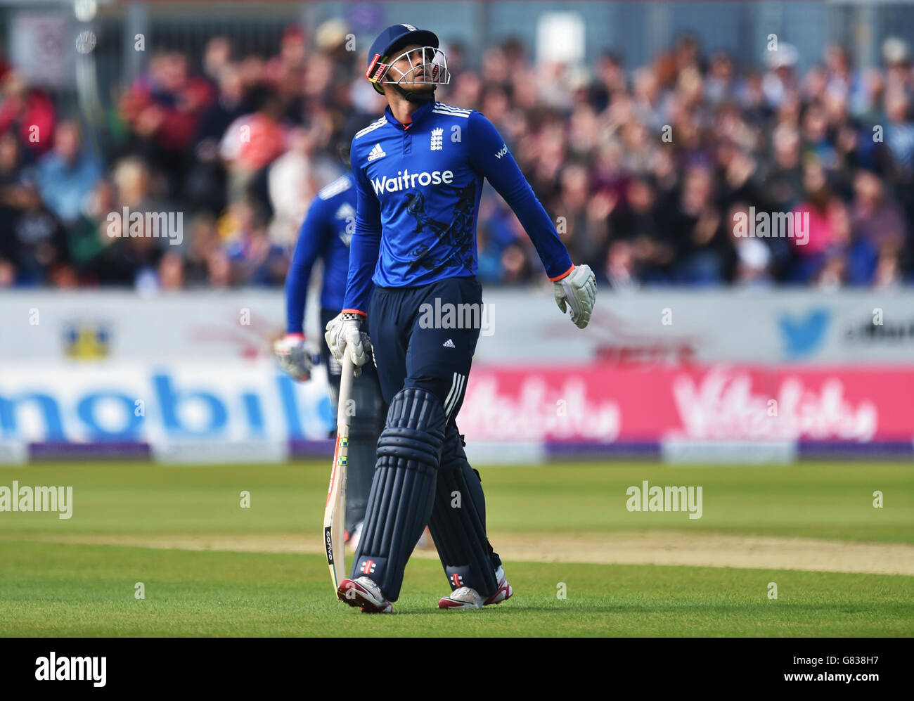 England's Alex Hales walks off after being caught by New Zealand's Kane ...