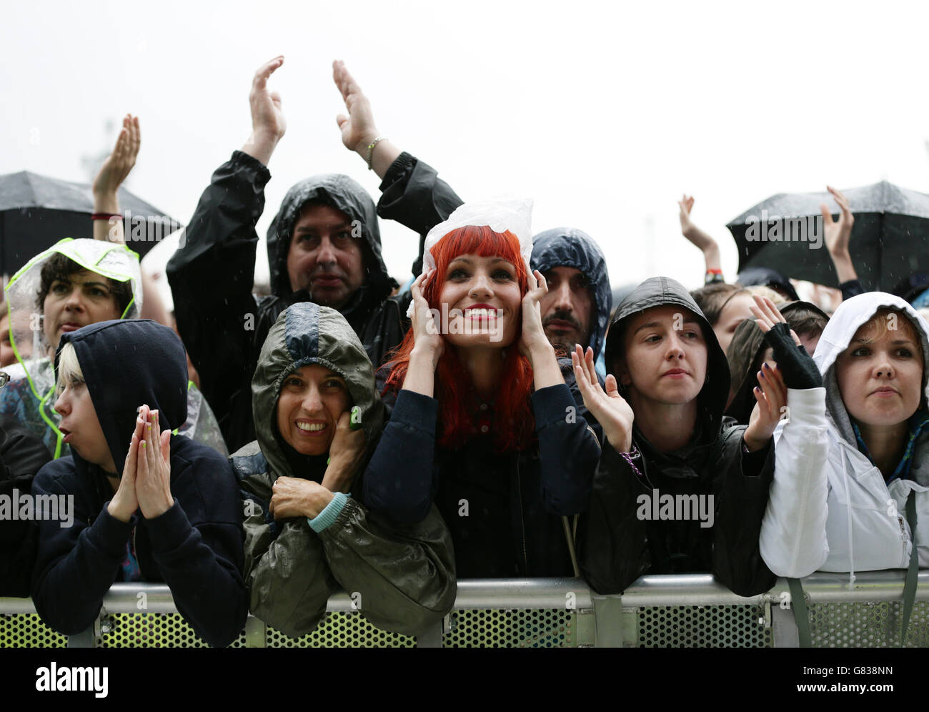 Fans watch Metronomy performing on the Great Oak Stage at the British ...