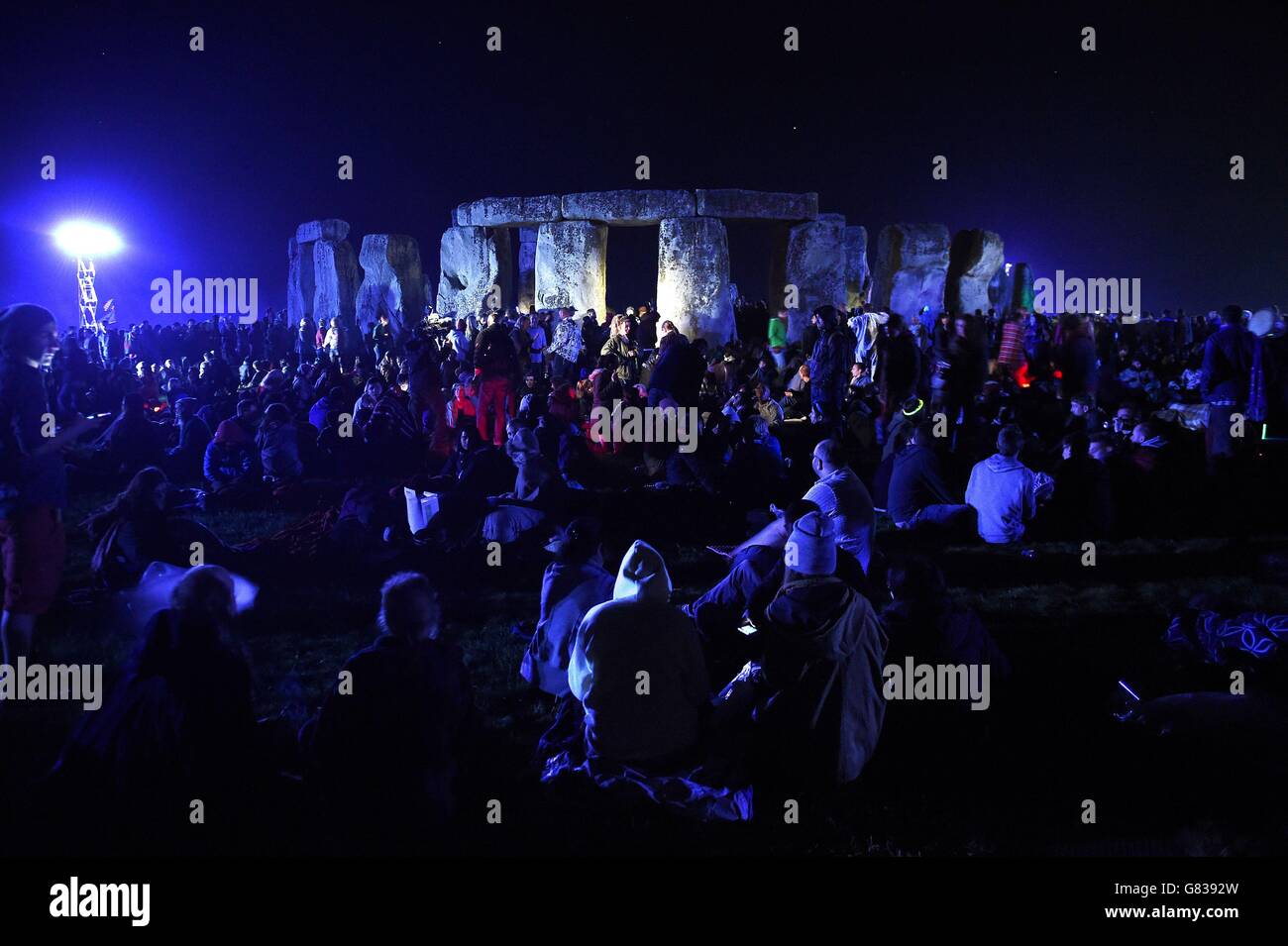 Crowds gather prior to dawn at Stonehenge in Wiltshire, as thousands of ...