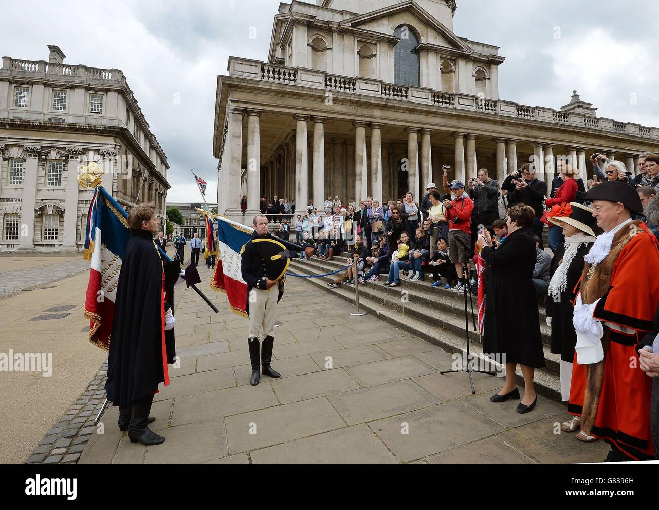 Actor Julian Farrance (left) dressed as Major Henry Percy announces the ...